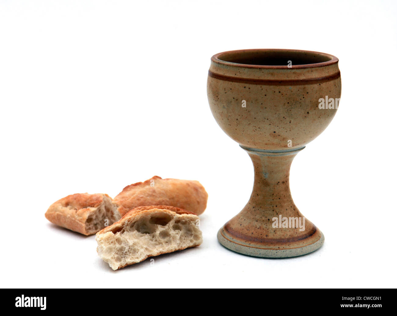 Bread and ceramic goblet for communion, isolated on white Stock Photo ...