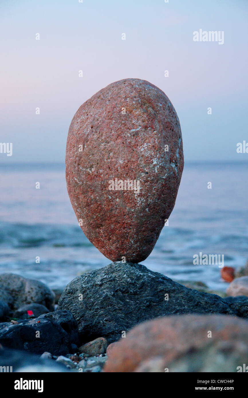 Balanced stones at Riveria coast line Stock Photo - Alamy