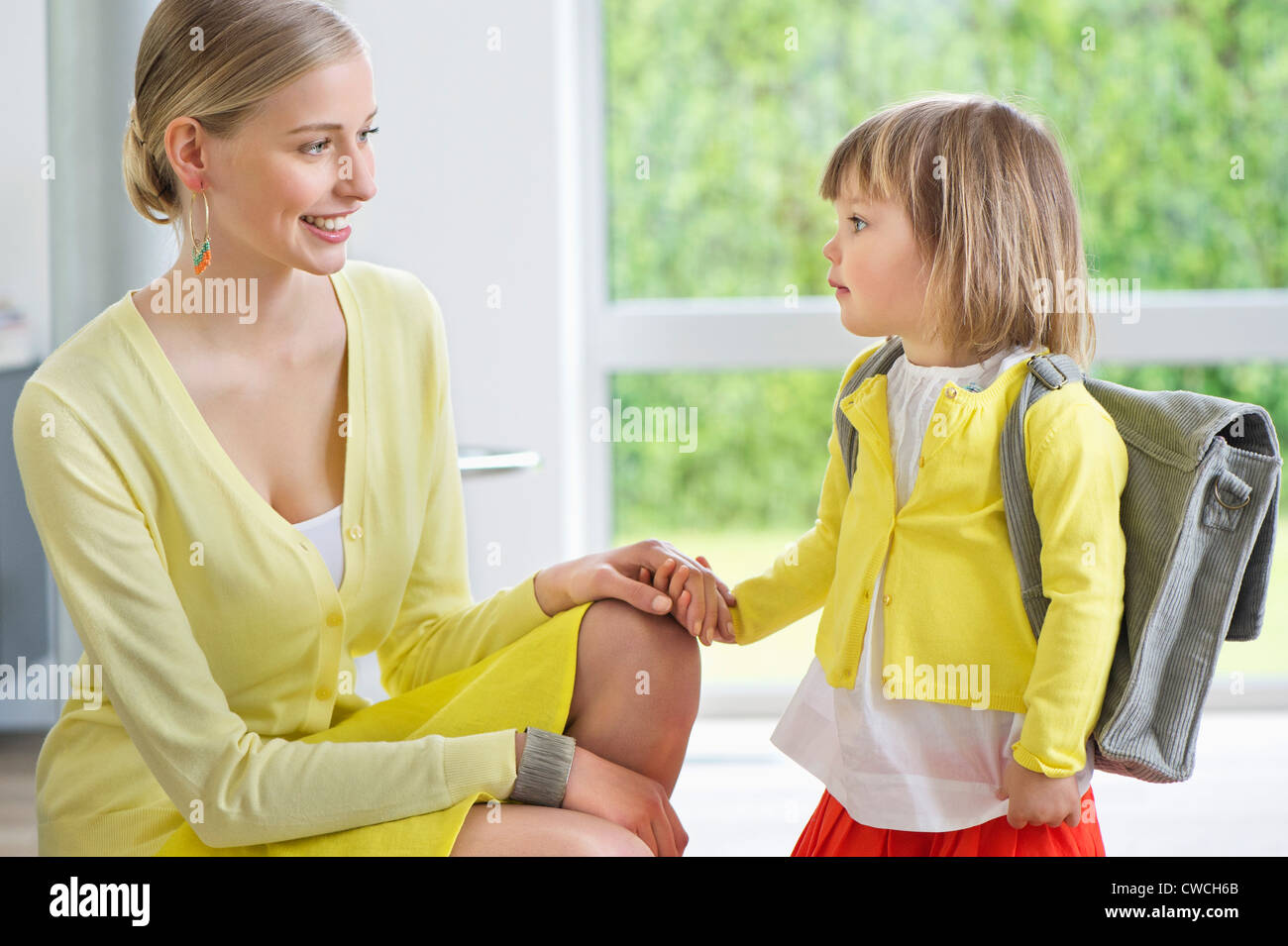 Little girl getting ready for school Stock Photo - Alamy