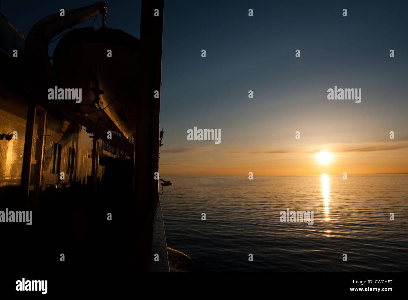Calm sea and beautiful sunset seen from a cruise ferry the Baltic sea ...