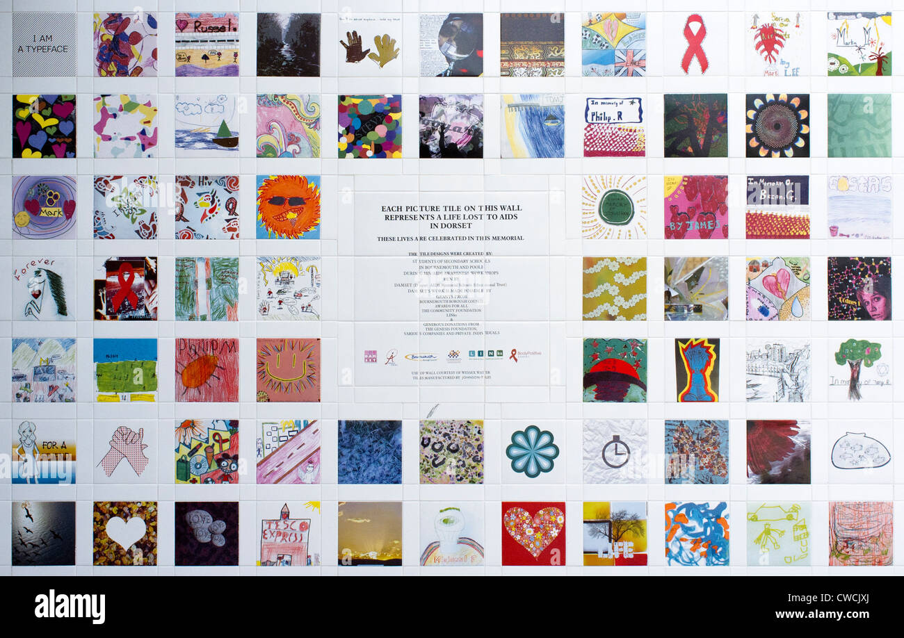 A wall of ceramic tiles with pictures printed on them. The wall serves ...