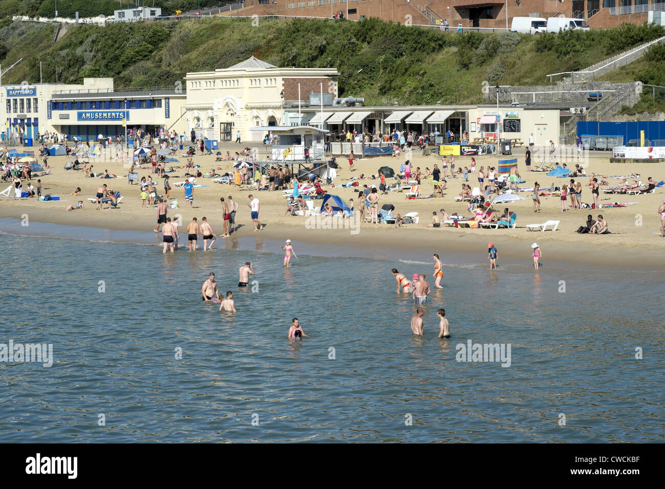 People on the beach and swimming in the sea at Bournemouth Stock Photo ...