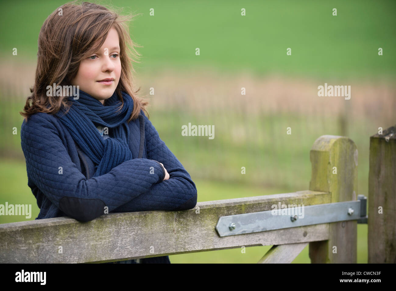 Girl thinking in a farm Stock Photo - Alamy