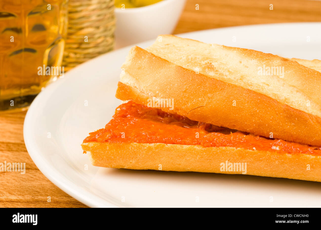Bread spread with traditional Spanish sobrasada mince served on a ...