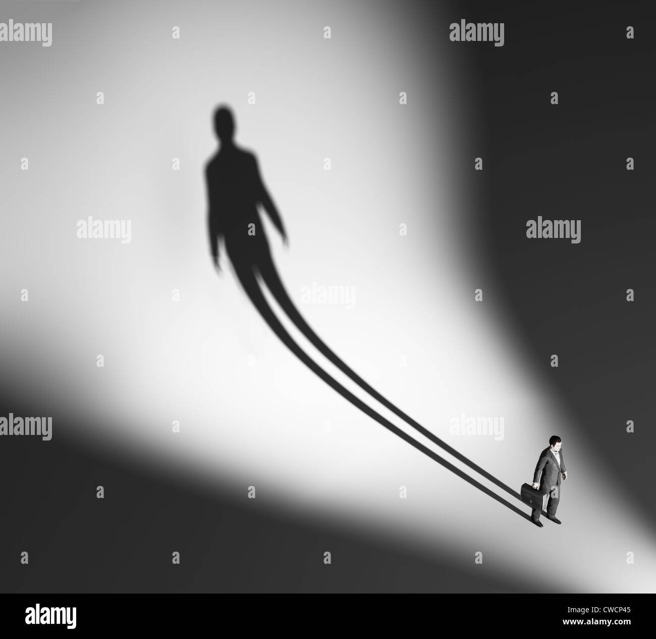 Business man casting a long and dramatic shadow Stock Photo - Alamy