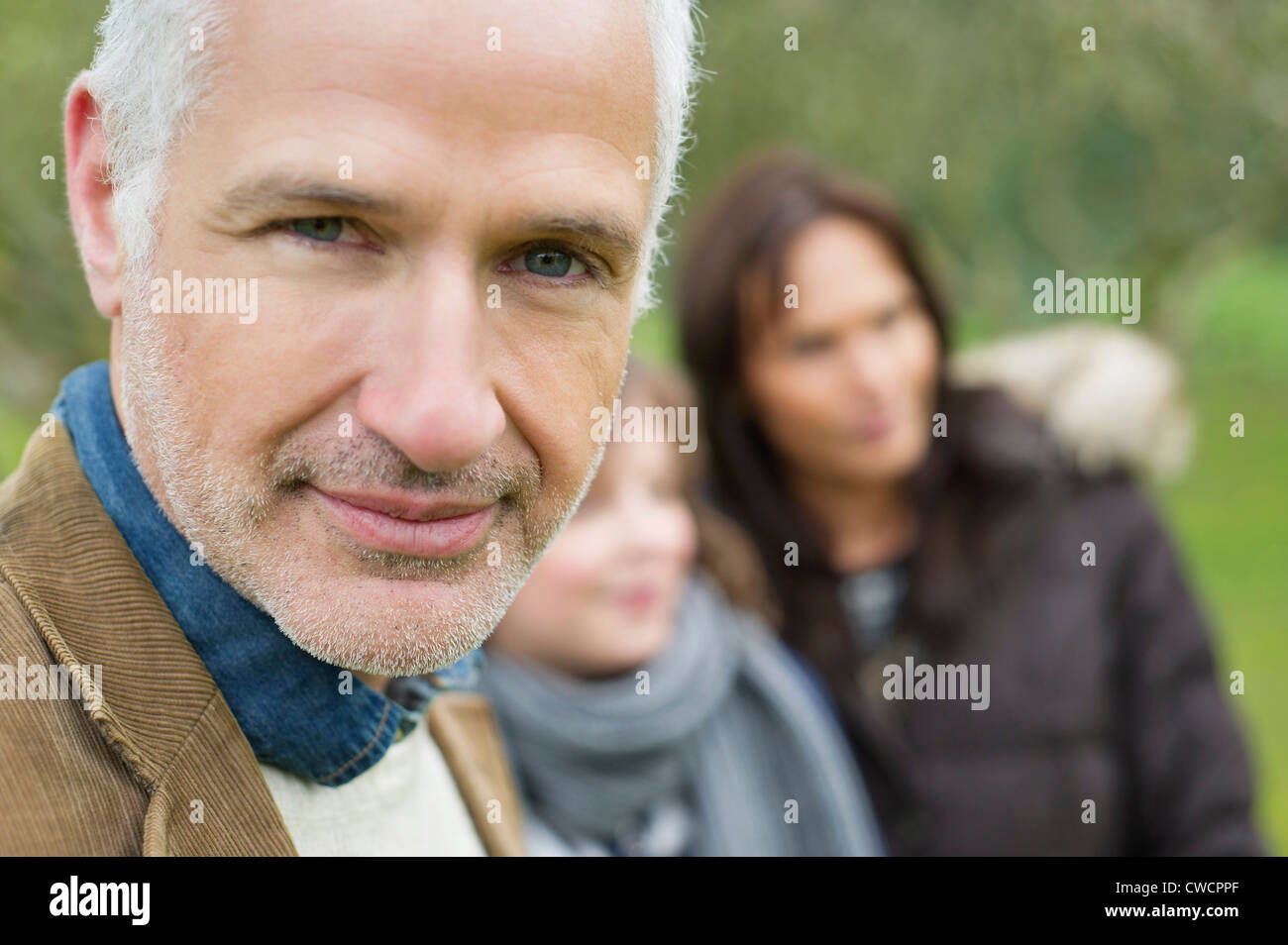 Portrait of a man with his family Stock Photo - Alamy