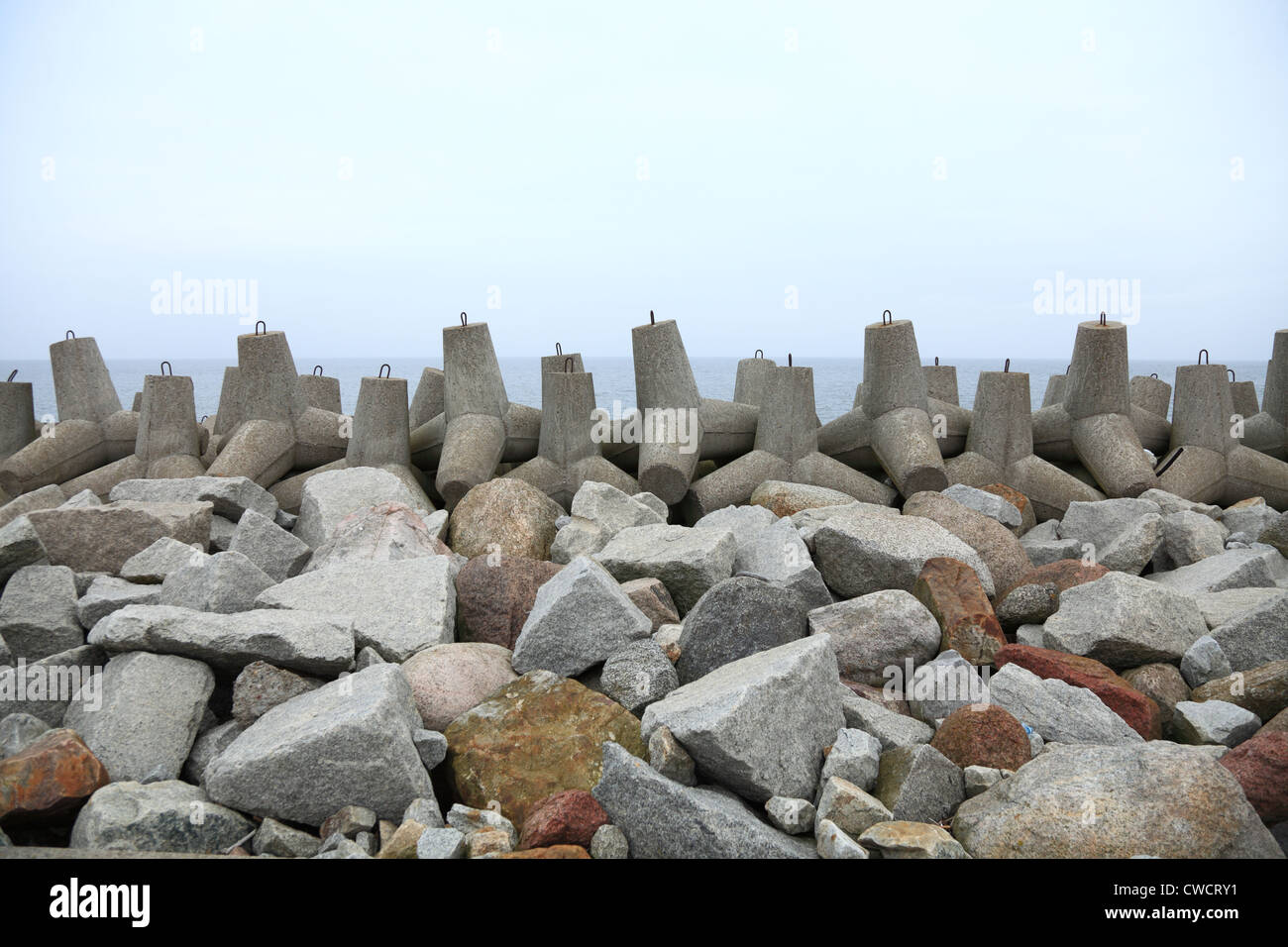Dam of stones on the coast Stock Photo - Alamy