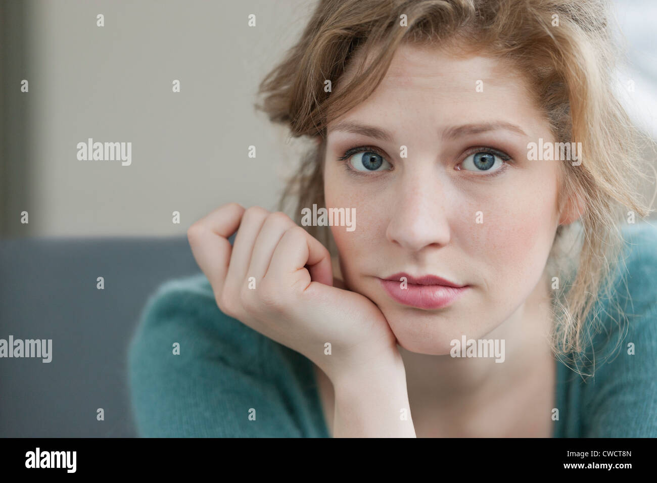 Woman looking sad Stock Photo - Alamy