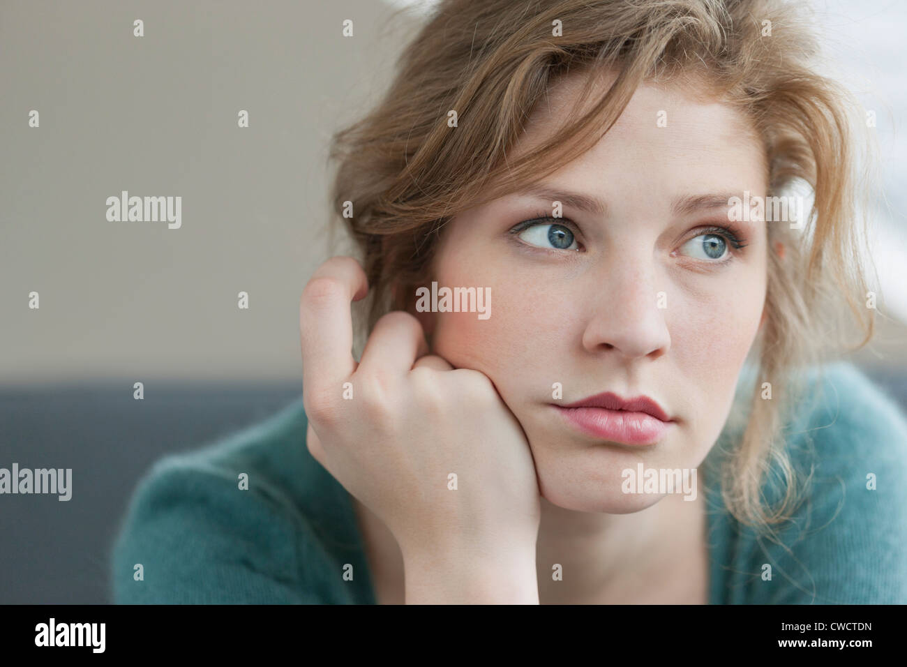 Woman looking sad Stock Photo - Alamy