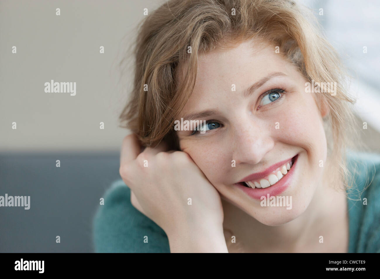 Woman looking happy Stock Photo - Alamy