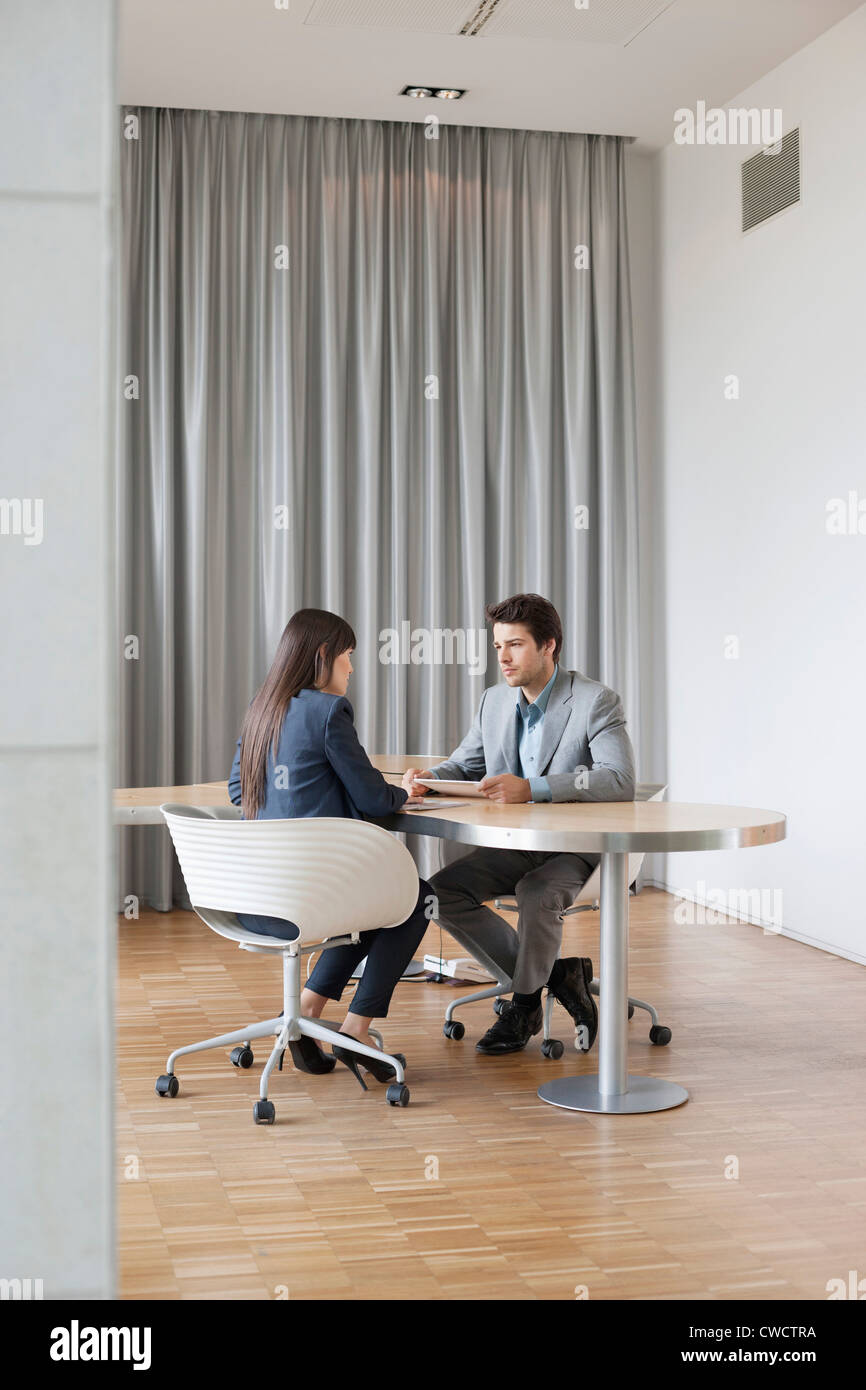 Business executives having a meeting in an office Stock Photo - Alamy