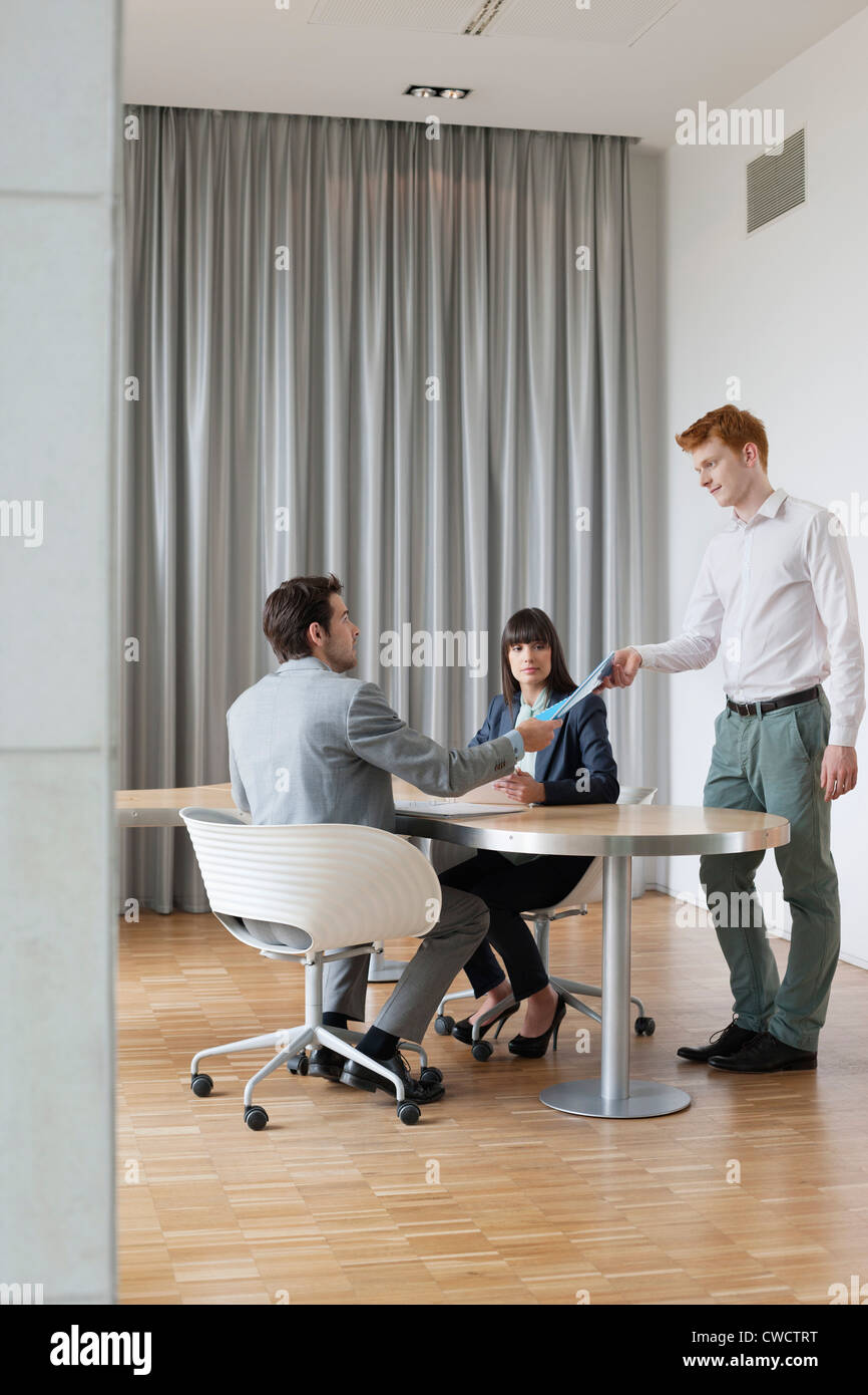 Business executives having a meeting in an office Stock Photo - Alamy