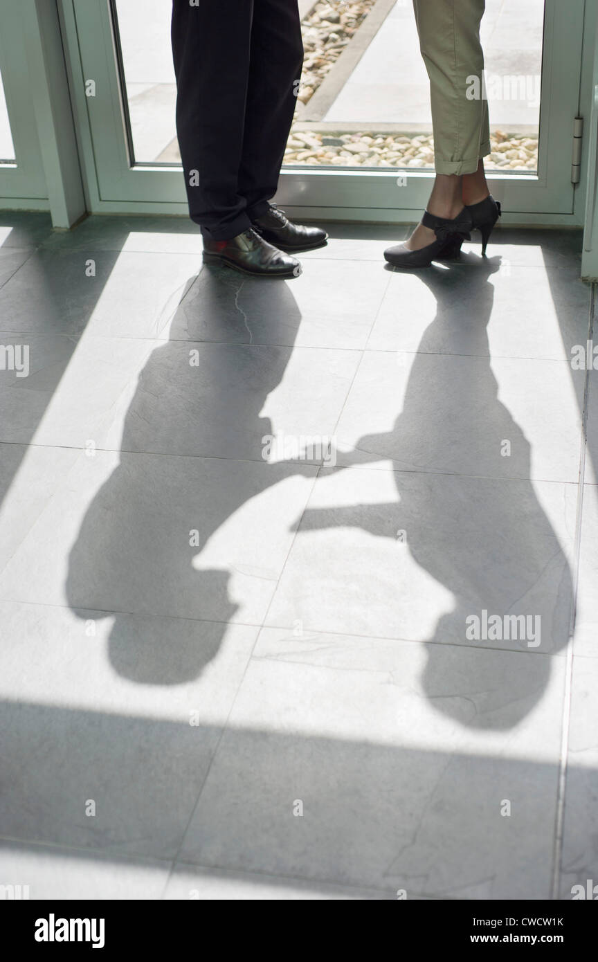 Businessmen greeting shadow hi-res stock photography and images - Alamy