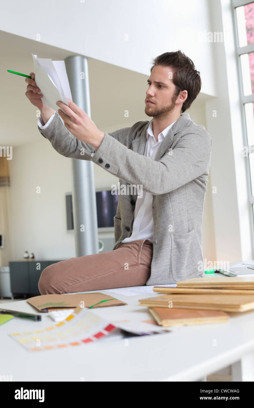 Interior designer working in the office Stock Photo - Alamy