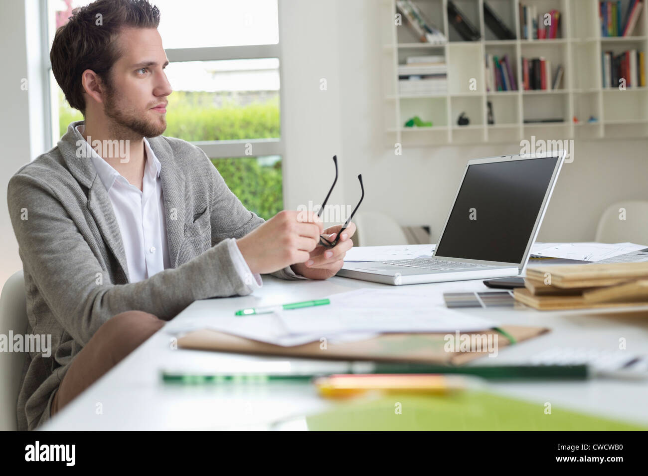 Interior designer working in the office Stock Photo - Alamy