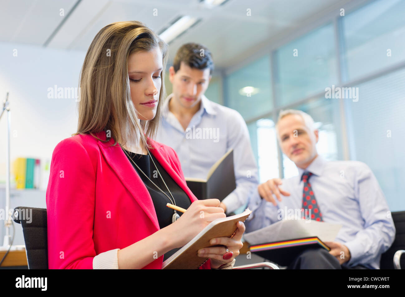 Business executives working in an office Stock Photo - Alamy