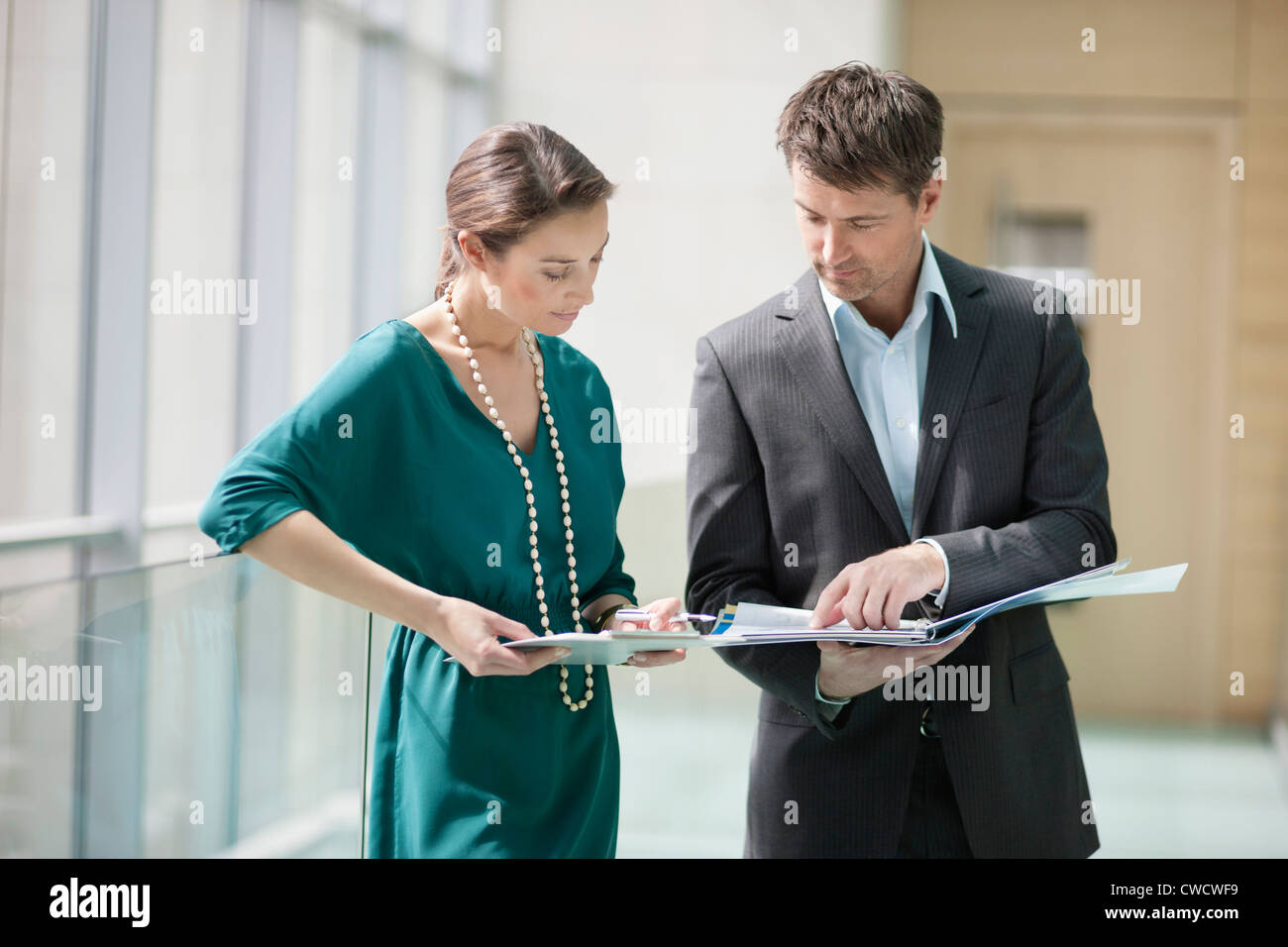 Business executives working in an office Stock Photo - Alamy