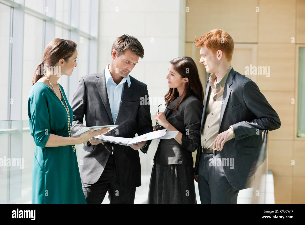 Business executives working in an office Stock Photo - Alamy