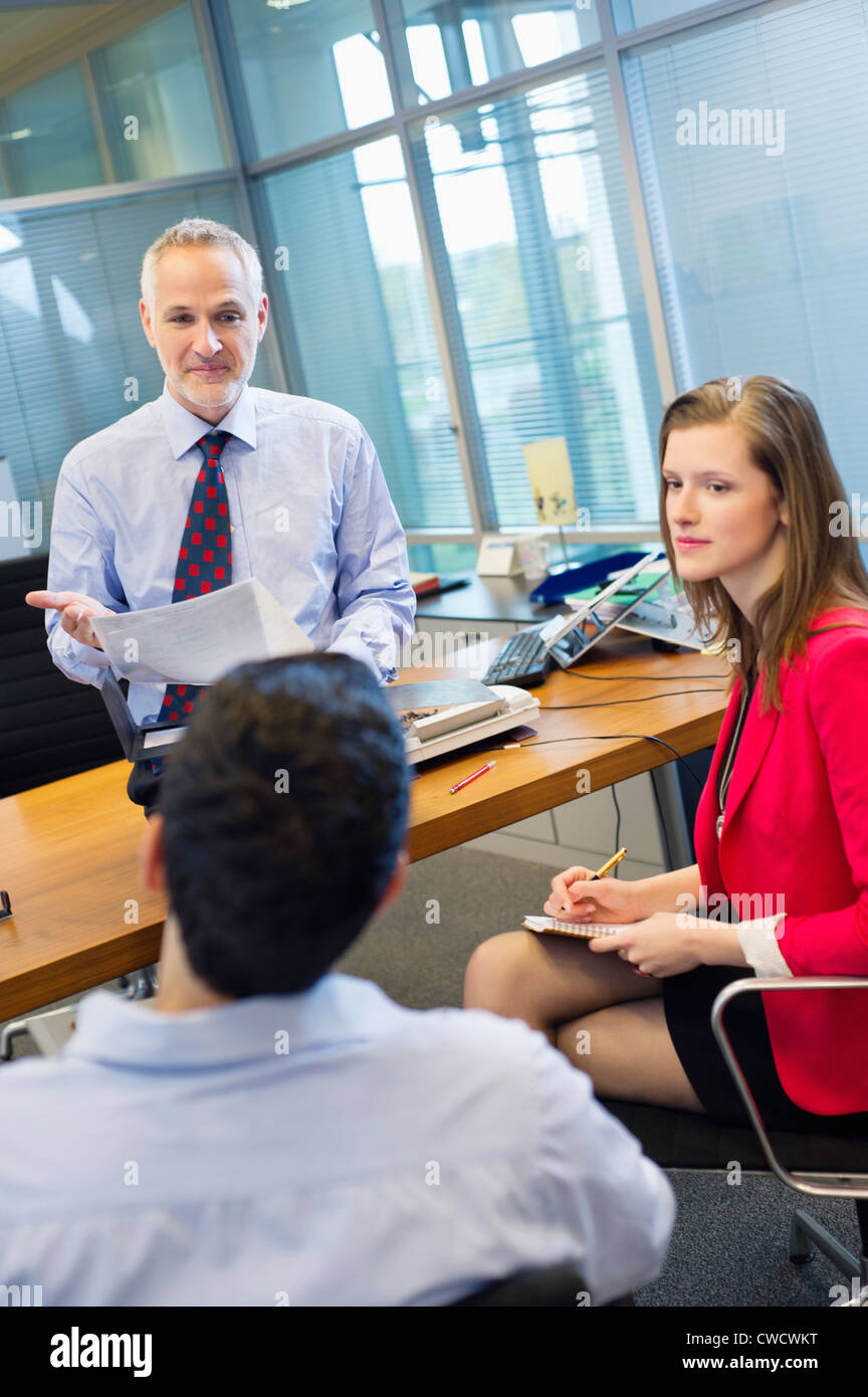 Business executives discussing in an office Stock Photo - Alamy