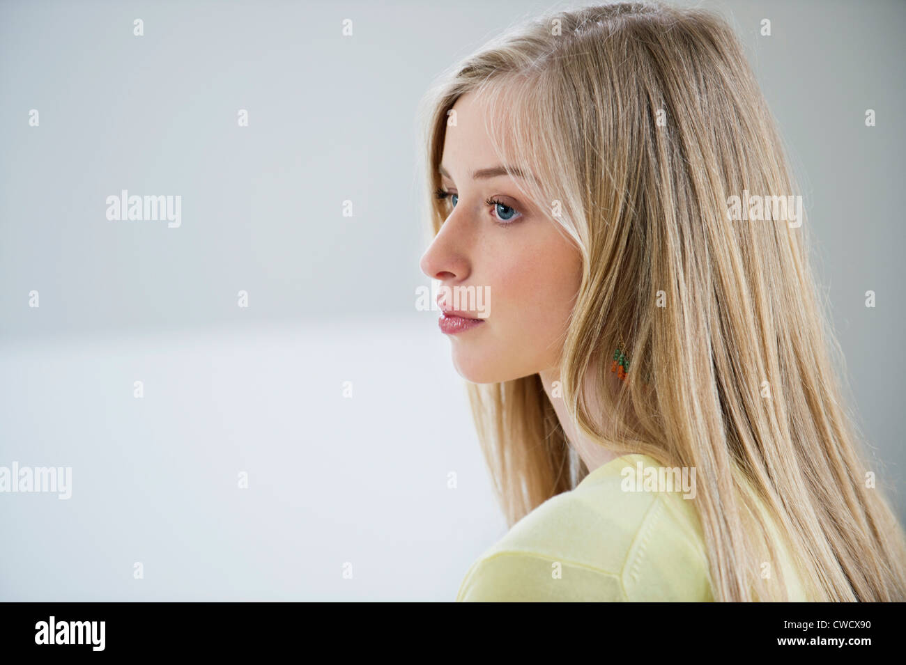 Woman looking serious Stock Photo - Alamy