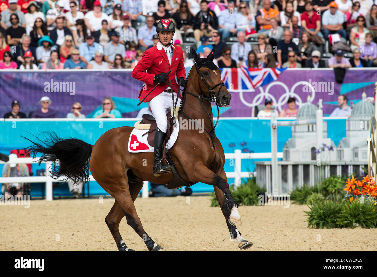 Werner Muff (SUi) riding Kiamon in the Individual Jumping Equestrian event at the Olympic Summer ...