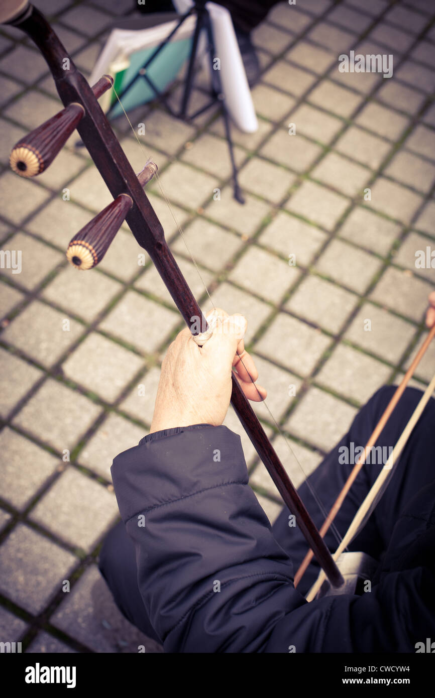 Musician Playing Erhu Chinese Musical Stock Photos & Musician Playing ...