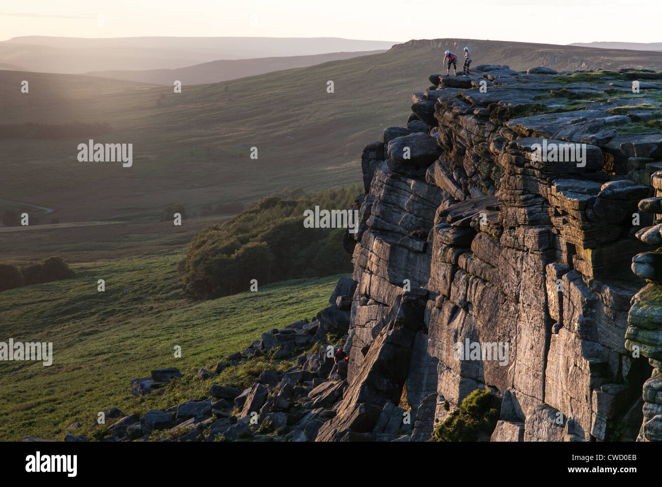 Evening light at Stanage Edge, Derbyshire, a popular rock climbing area ...