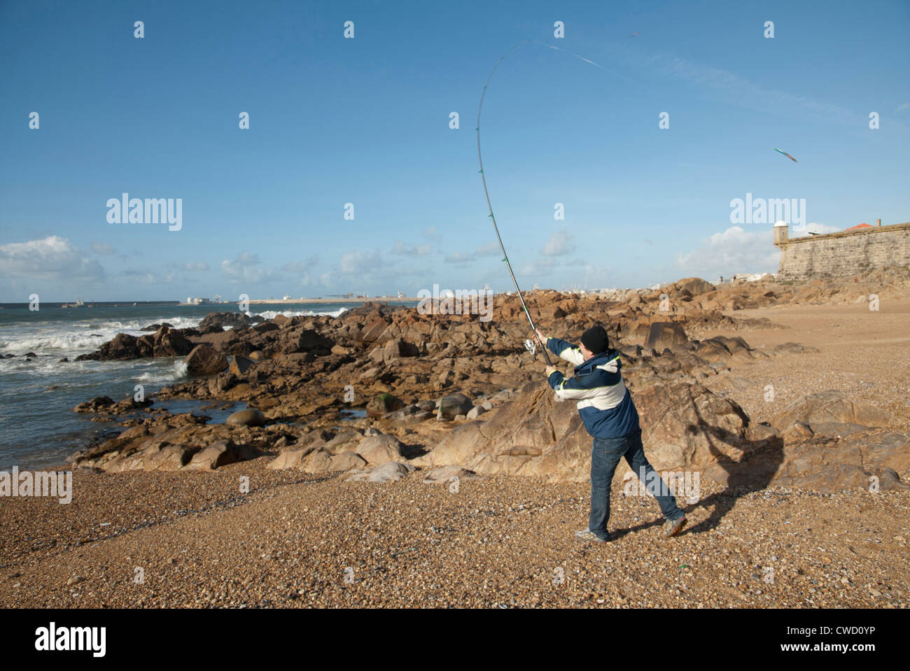 Surfcasting beach fishing hi-res stock photography and images - Alamy