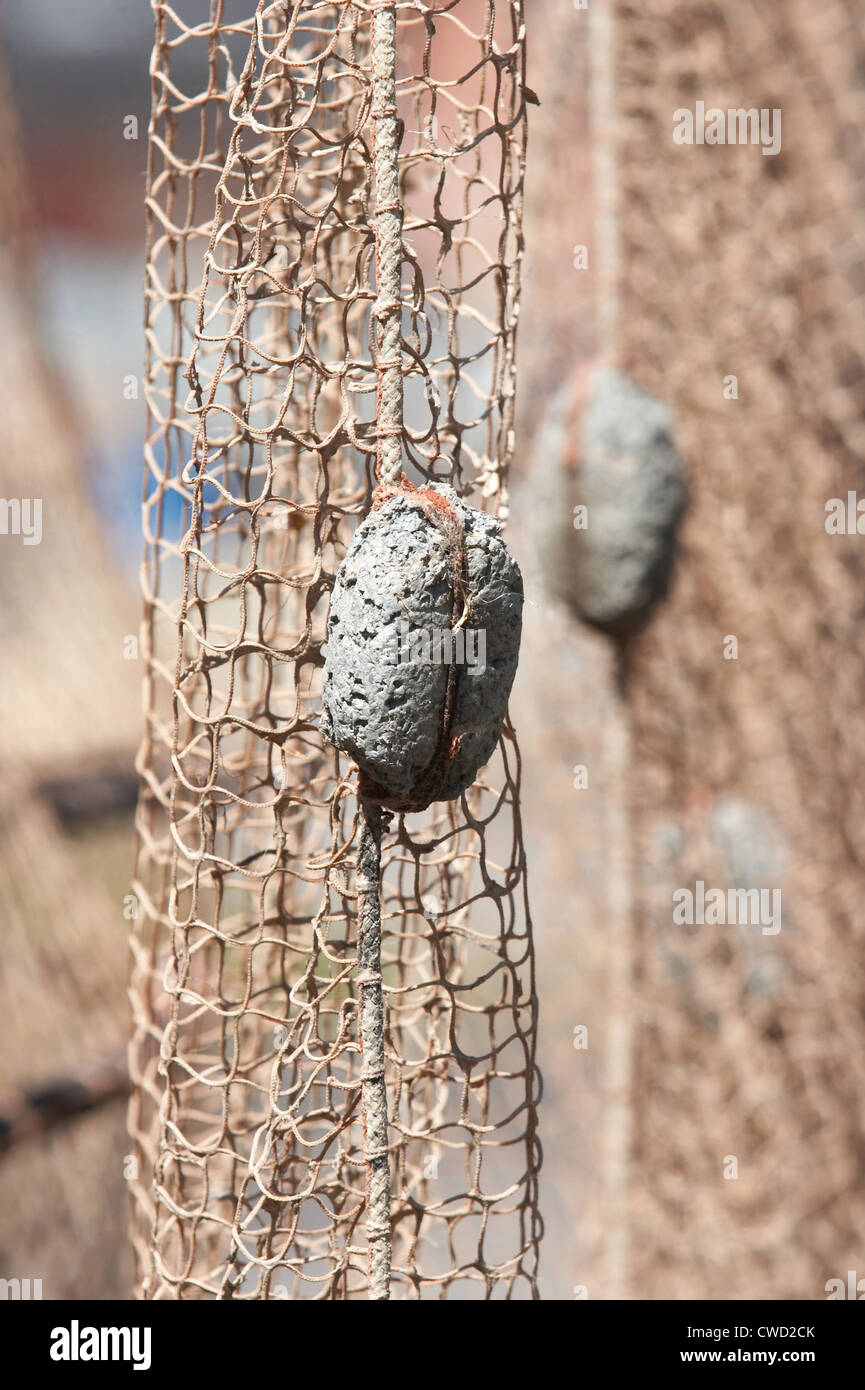 Detail of a fishing net Stock Photo - Alamy