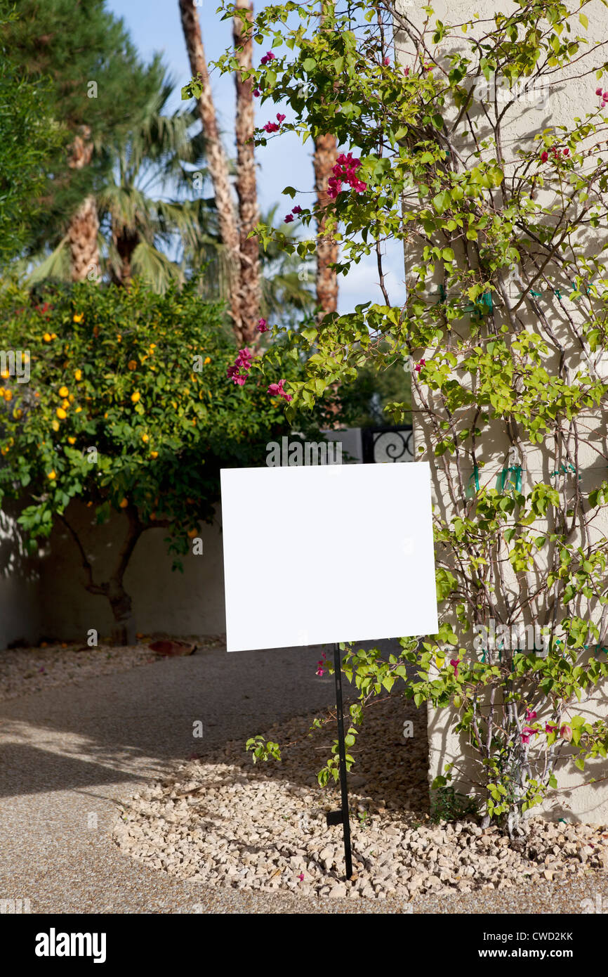 Real estate sign board outside house Stock Photo - Alamy