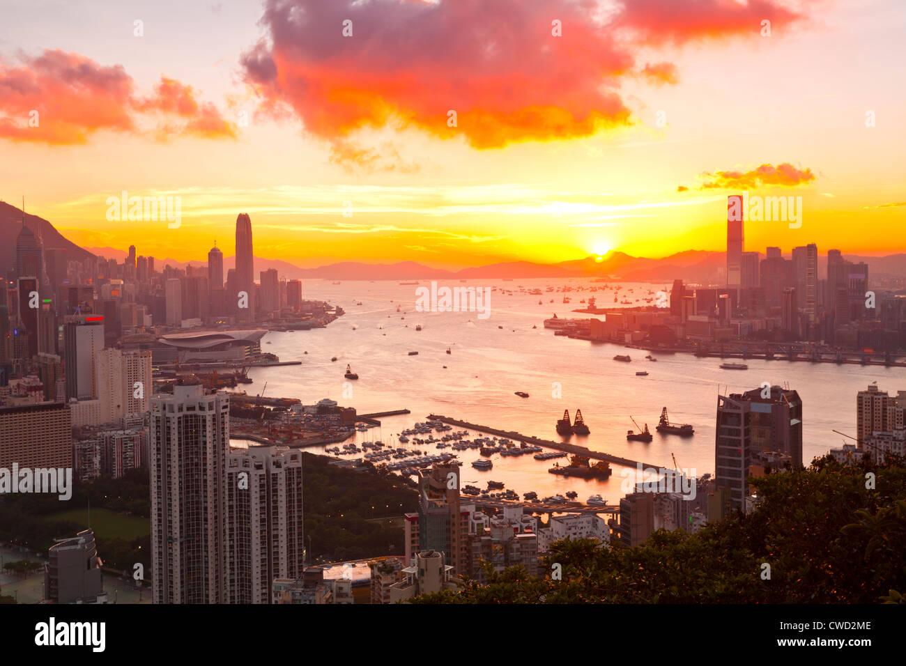 Hong Kong sunset at downtown Stock Photo - Alamy