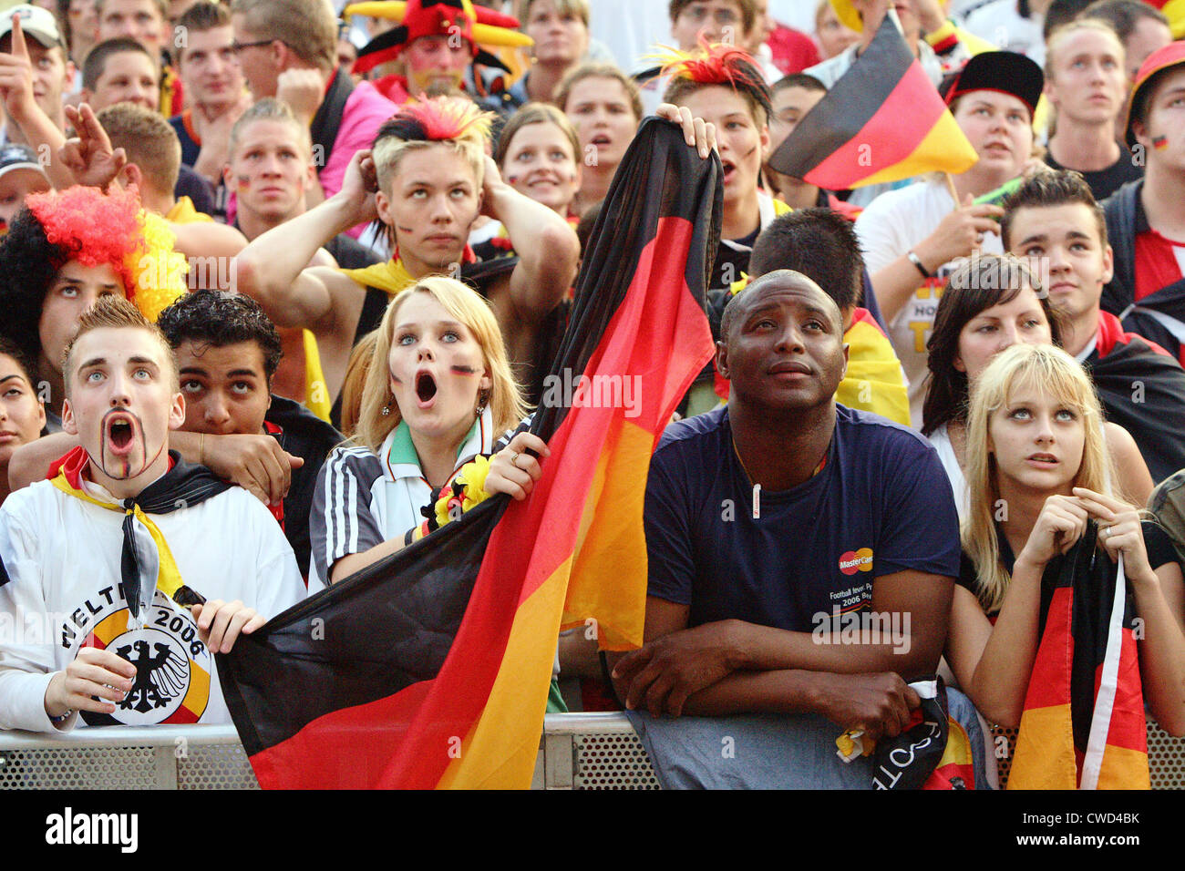 Football fans at the fan mile in front of the Brandenburg Gate, Berlin ...