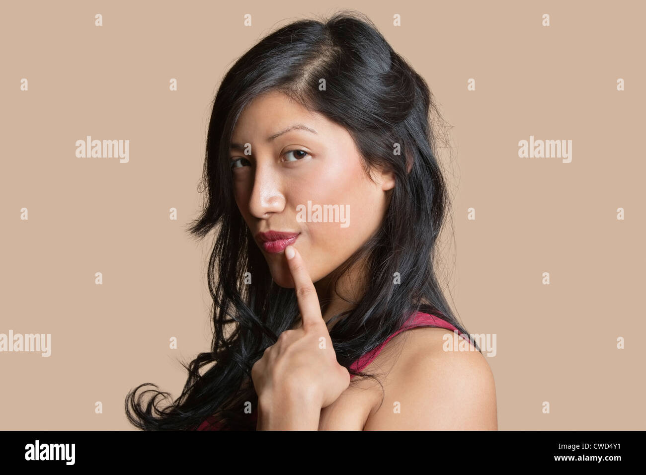 Finger over lip hi-res stock photography and images - Alamy