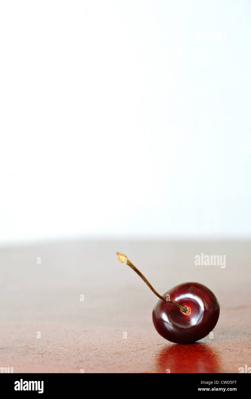 A single cherry Stock Photo - Alamy