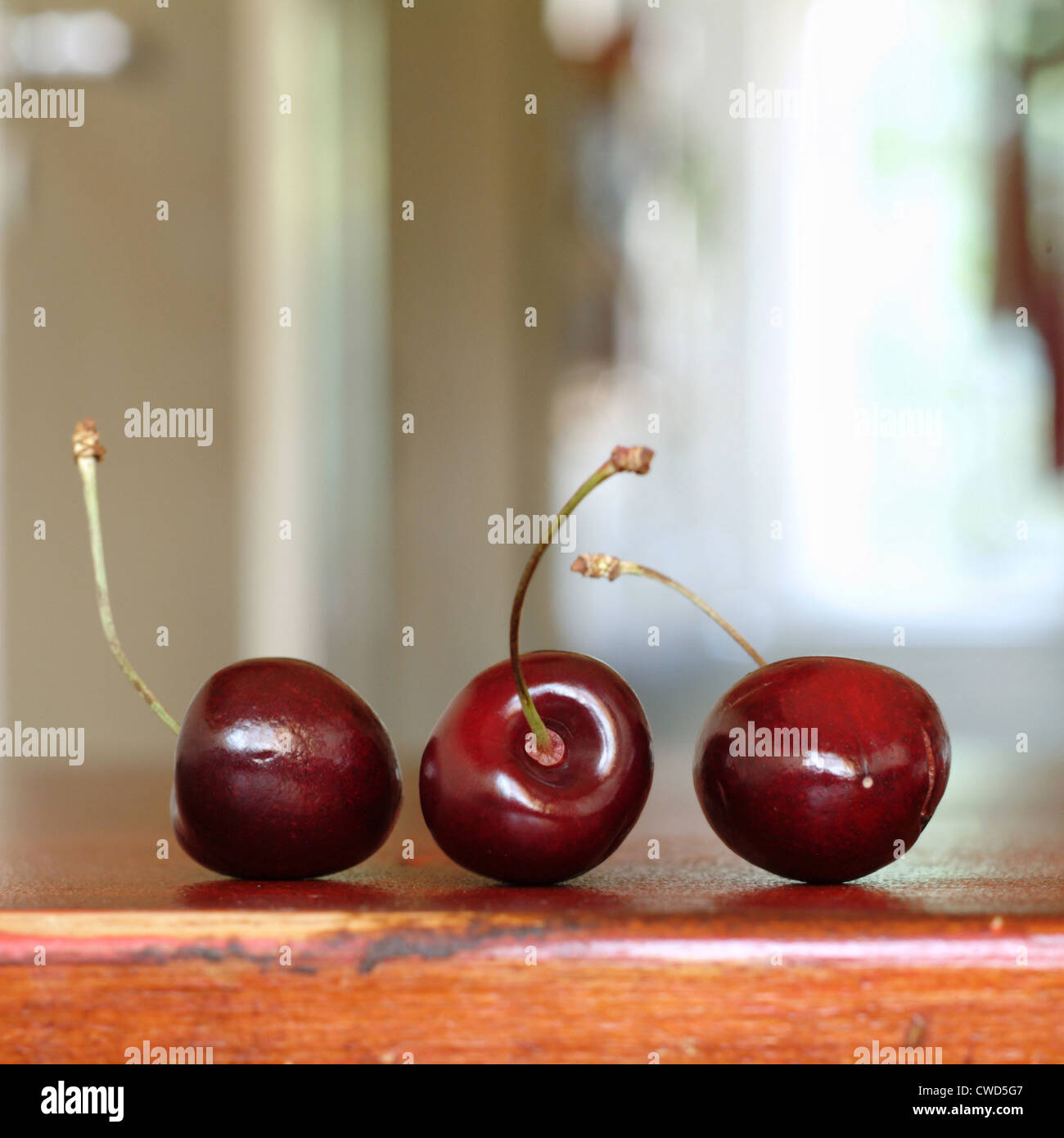 Three Tiered cherries Stock Photo - Alamy