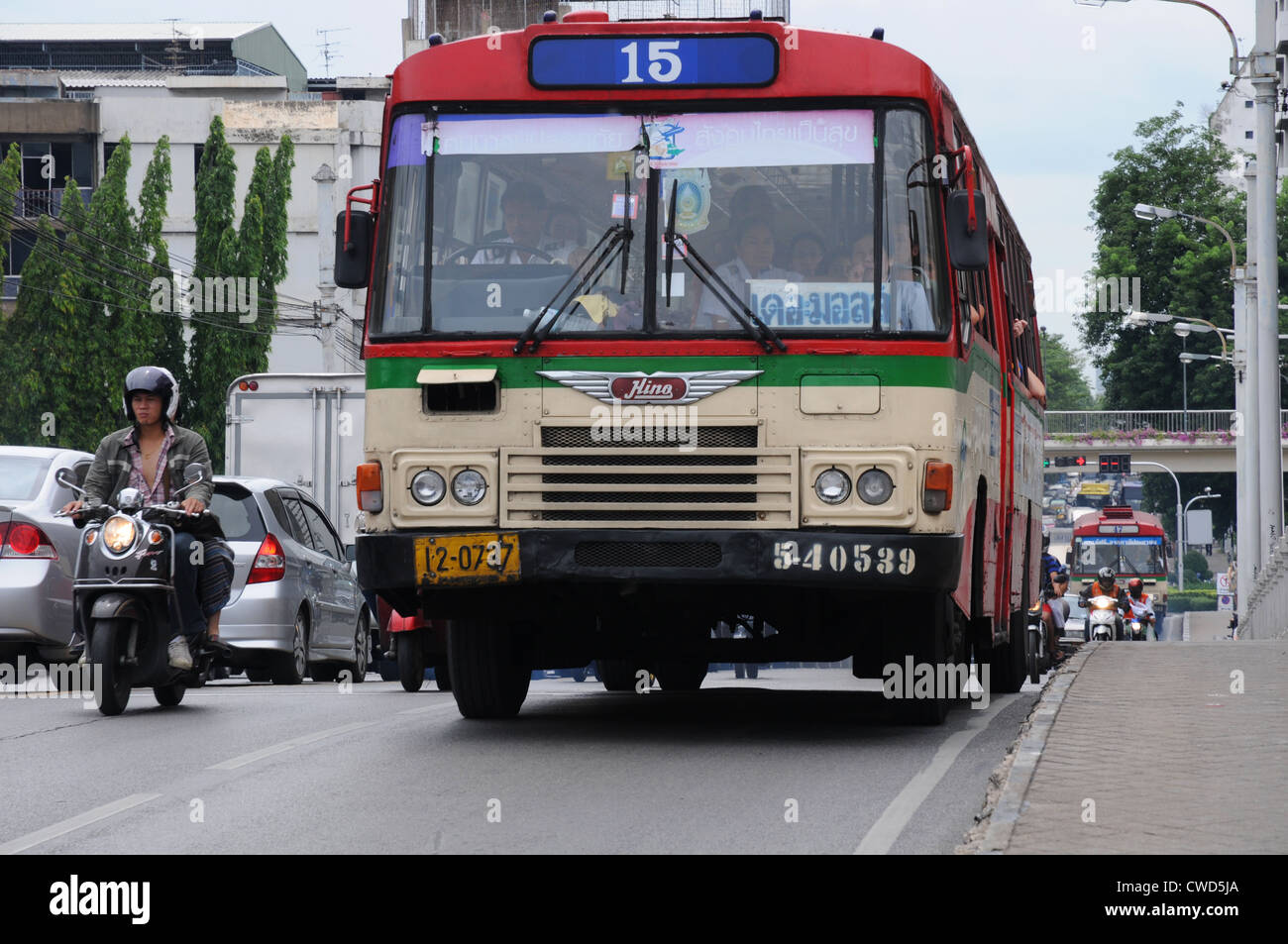 Packed number 15 bus crests bridge in heavy morning traffic, Sukhumvit ...