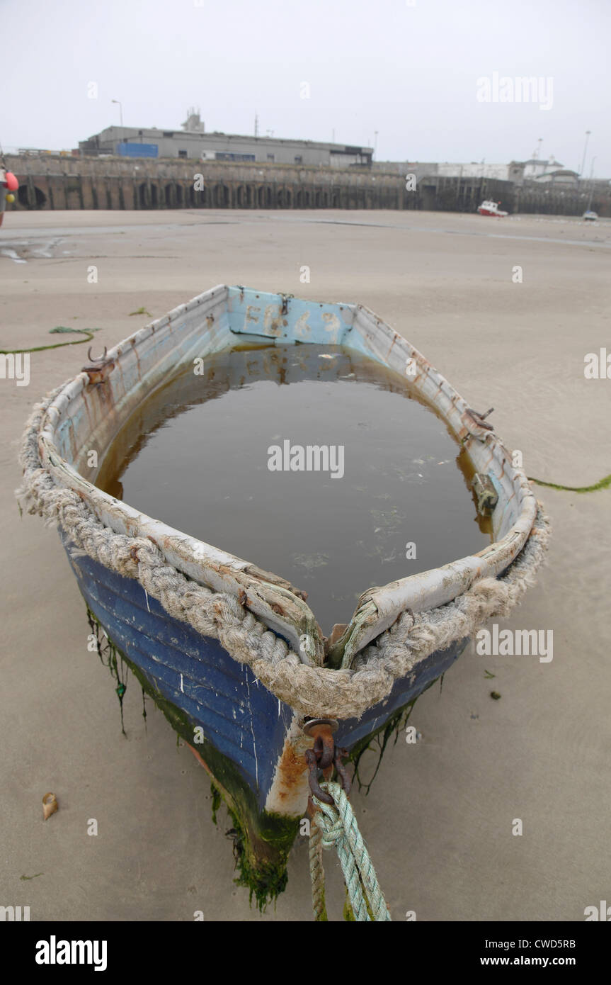 Sea water in a boat on the beach in Folkestone Stock Photo - Alamy