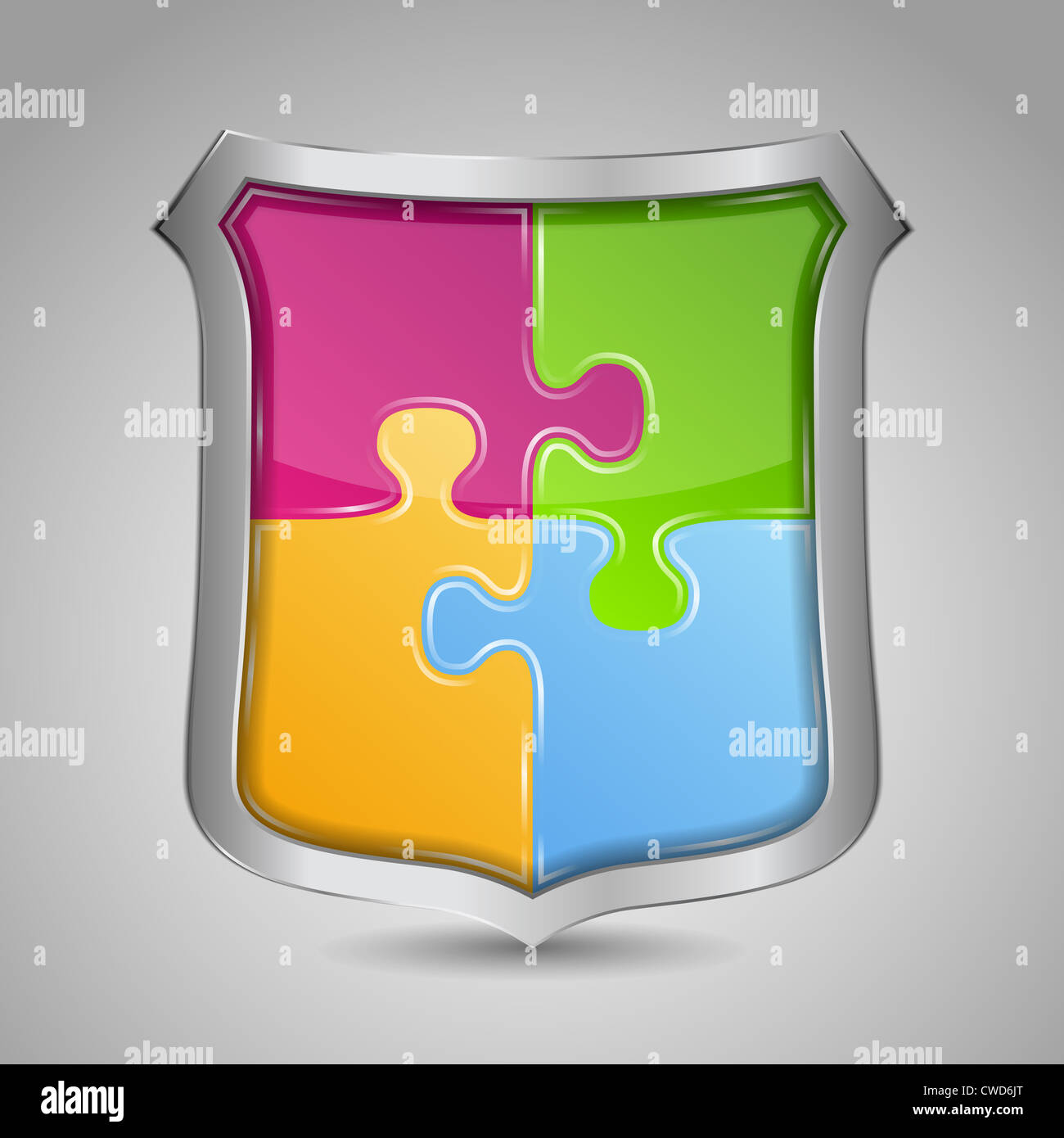 Shield with puzzle pieces Stock Photo - Alamy