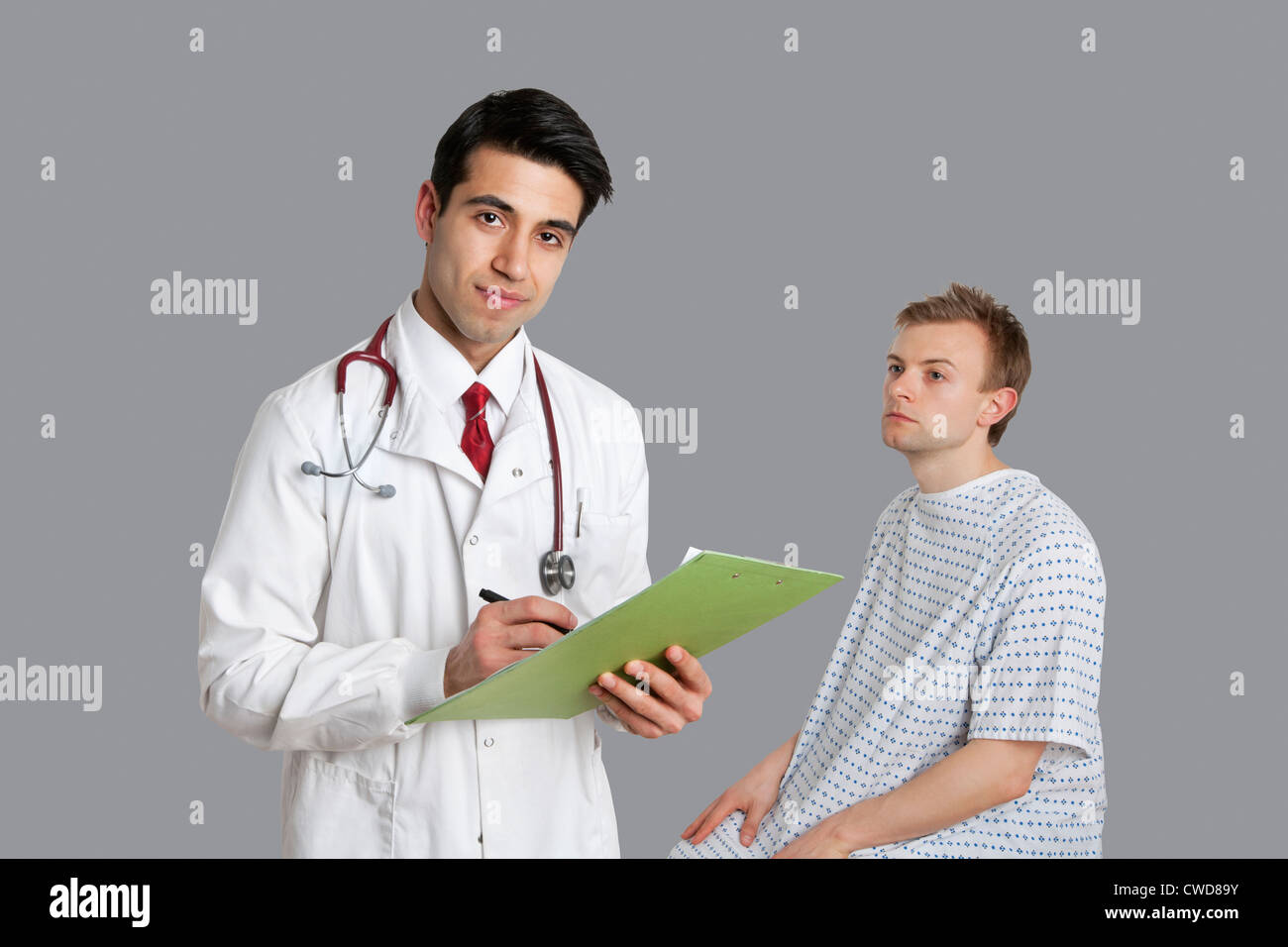 Indian doctor writing hi-res stock photography and images - Alamy