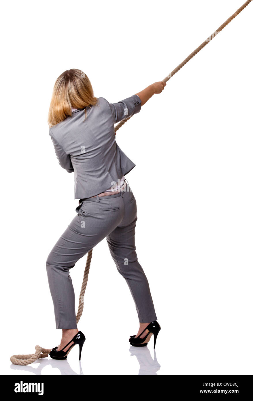 young businesswoman pull rope isolated on white Stock Photo - Alamy