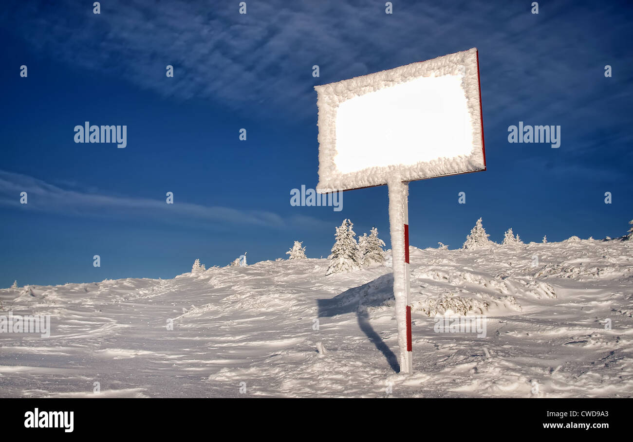 mountain winter landscape with empty billboard and blue sky Stock Photo ...