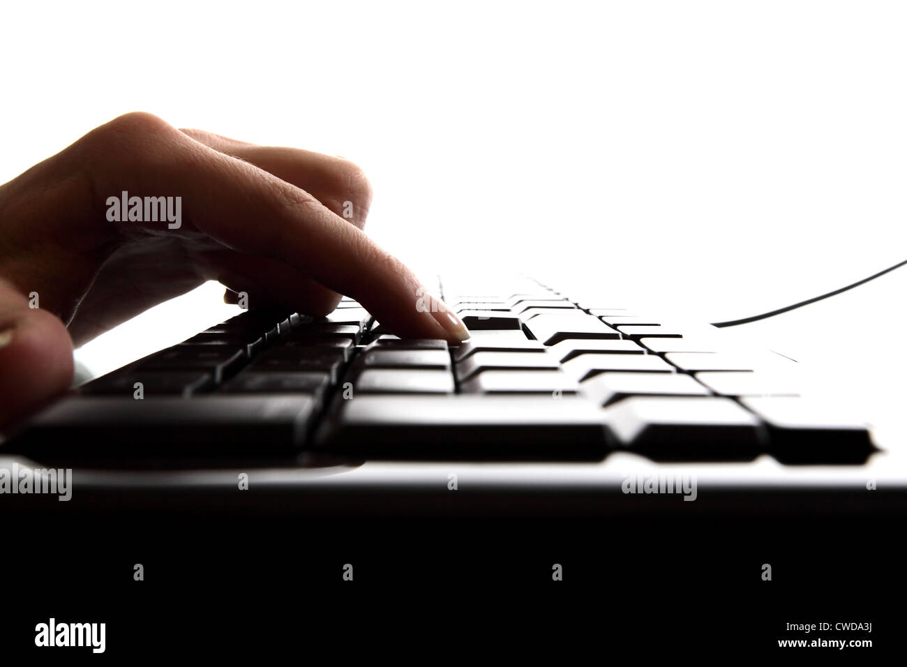 hand press a key on keyboard Stock Photo - Alamy