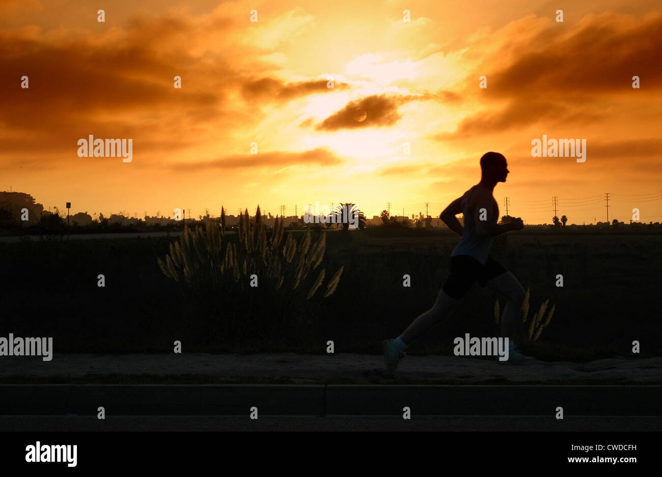 Solo Sunset Runner Stock Photo - Alamy