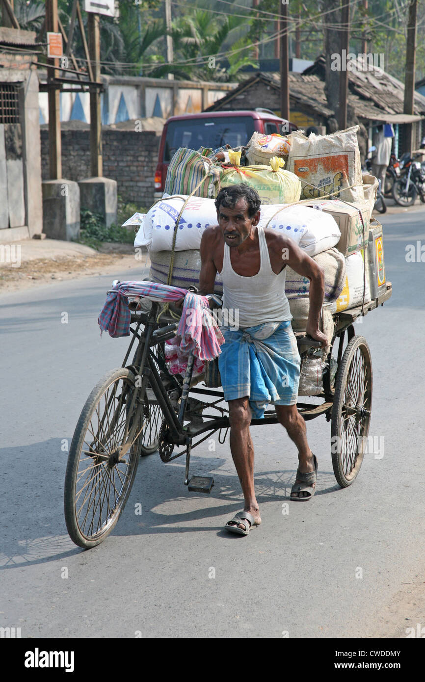 Loaded rickshaw hi-res stock photography and images - Alamy