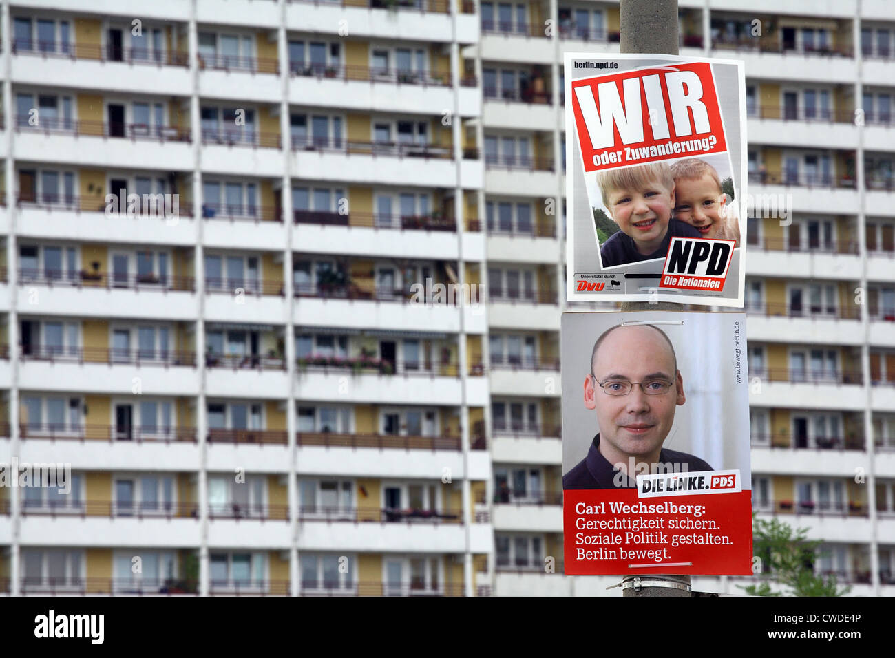 Election posters of the PDS and NPD ago tower in Berlin Stock Photo - Alamy