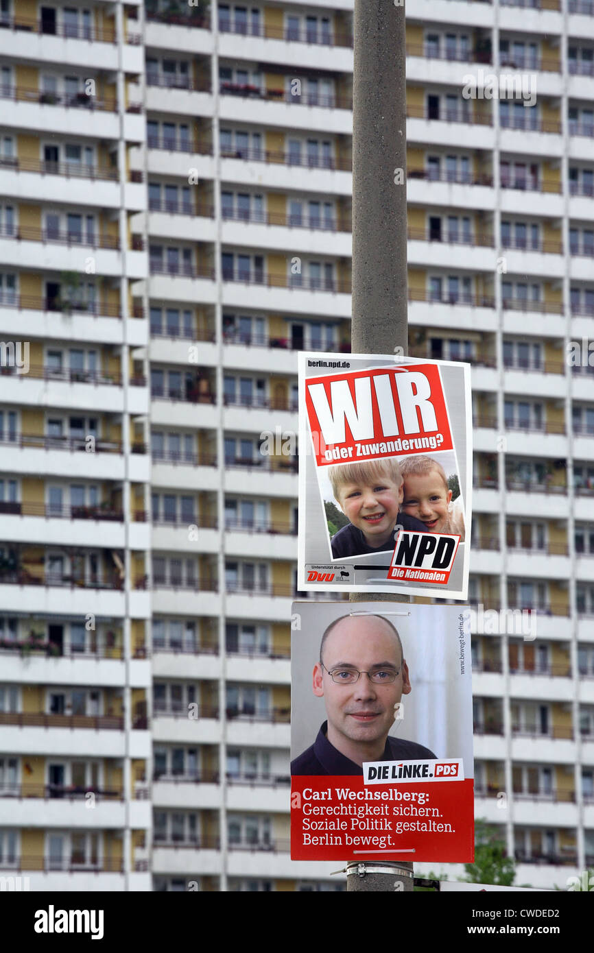Election posters of the PDS and NPD ago tower in Berlin Stock Photo - Alamy