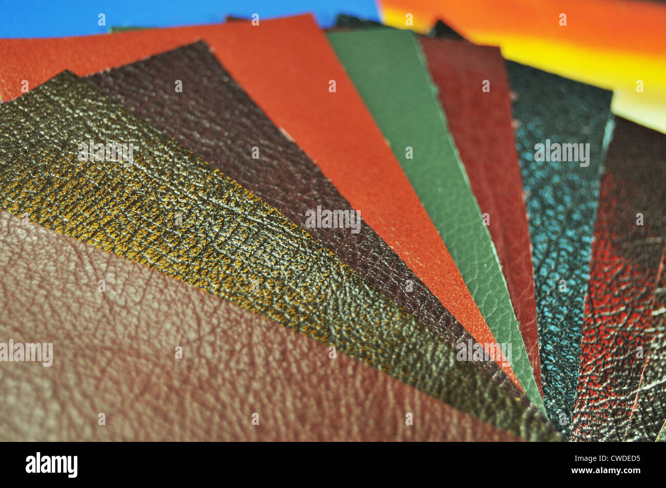 Various colours leather samples background Stock Photo - Alamy