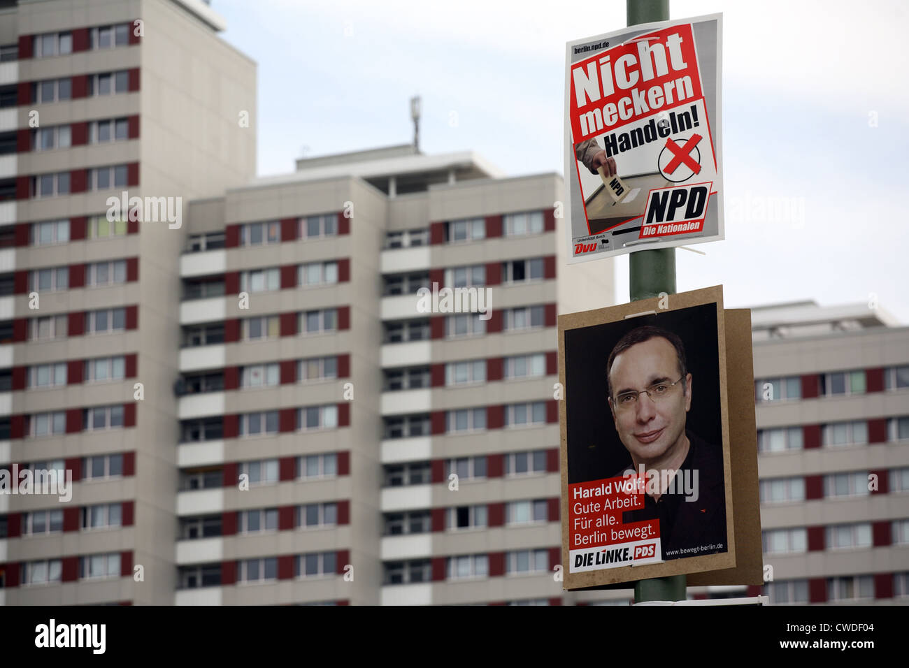 Election posters of PDS and NPD front tower in Berlin Stock Photo - Alamy