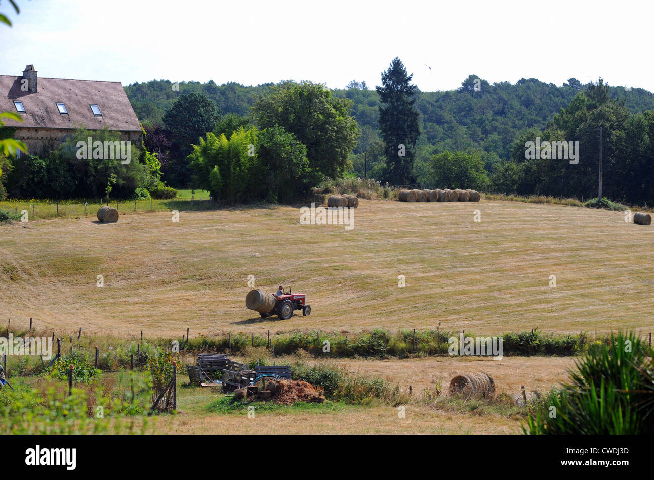 Farmer gathering hay bales hi-res stock photography and images - Alamy