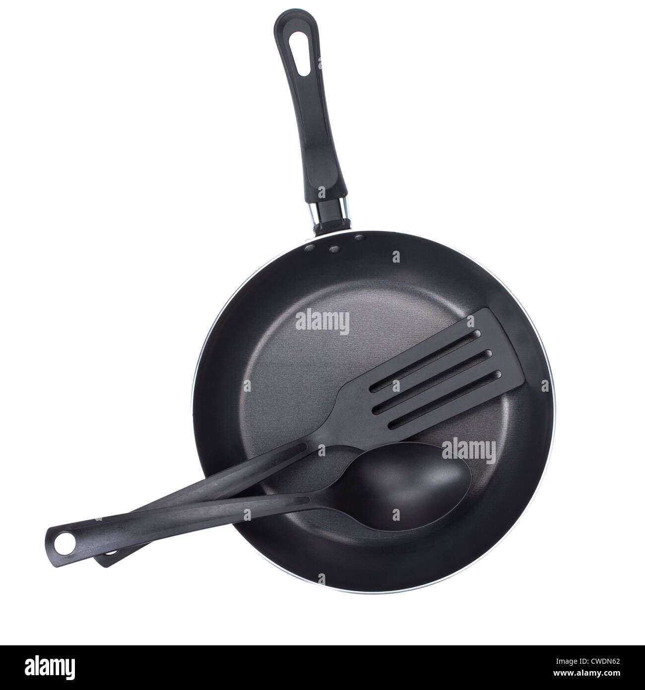 Frying pan with utensils. View from above. Isolated on white background ...